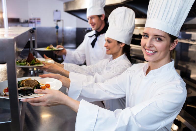 Chefs in Toques Preparing and Chopping Food Stock Image - Image of soul ...