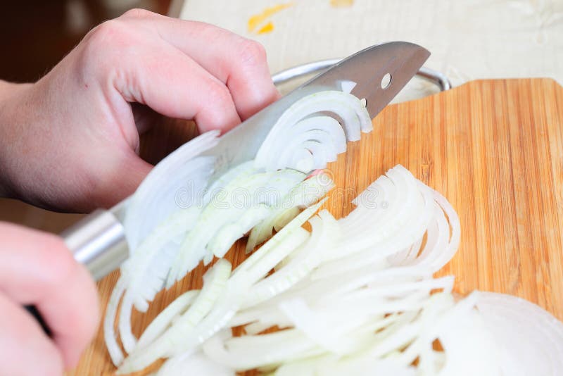 Chefs hands chopping onion stock image. Image of cook - 51607481