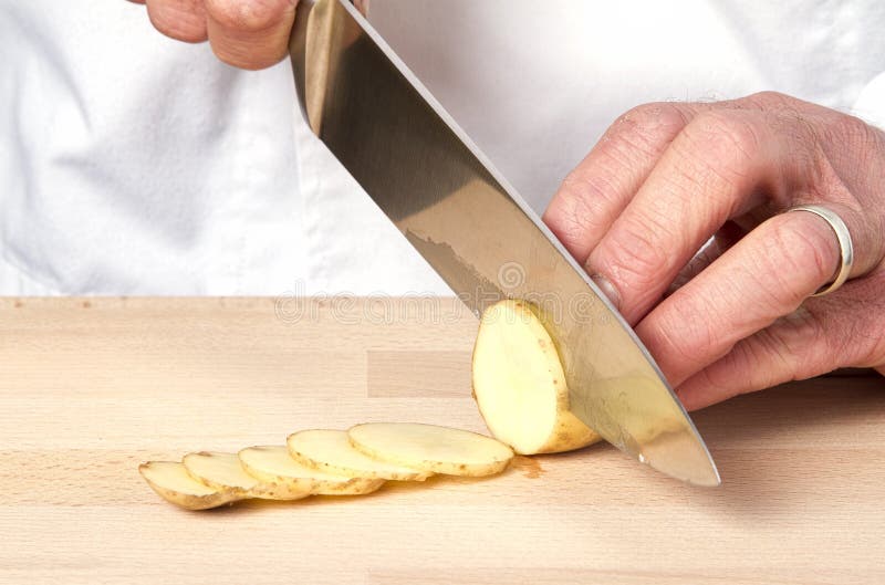 Chefs Hands Chopping Potato Stock Image - Image of caucasian ...