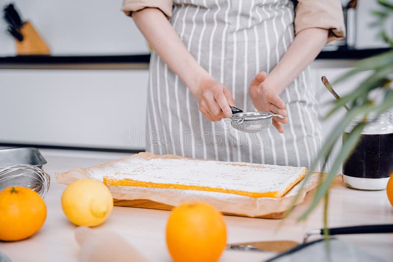 Chefs Hands with Small Sieve for Baking. Baker Decorating and ...