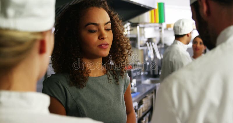 Chefs Interacting with Restaurant Manager Stock Footage - Video of ...