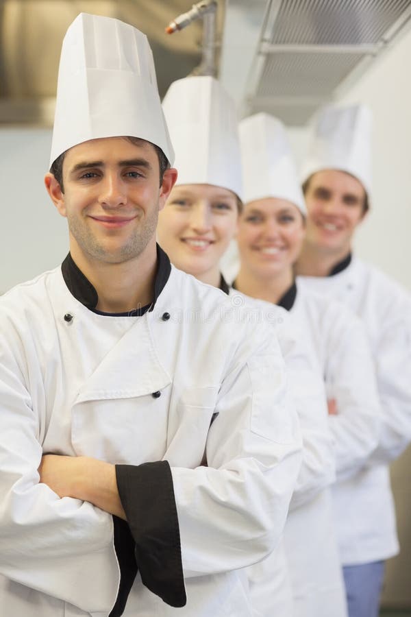 Chefs in line smiling stock image. Image of worker, team - 31098861