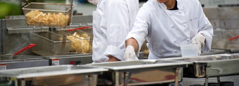 Chefs making fries stock photo. Image of item, caterer - 16321954