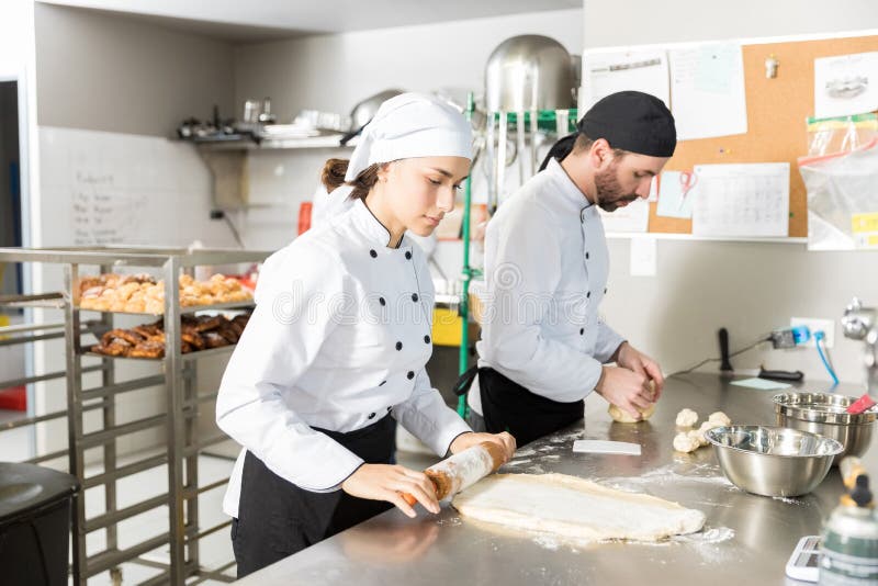 Chefs Preparing Bread Dough in Kitchen Stock Image - Image of uniform ...