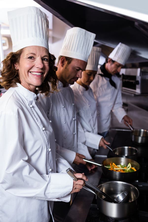 Chefs Preparing Food in Kitchen Stock Photo - Image of colleagues ...