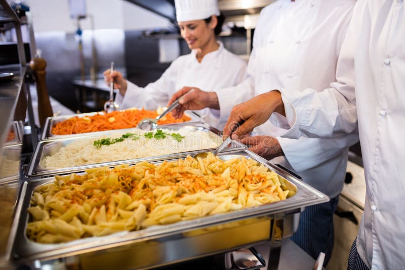 Chefs Standing at Serving Trays of Pasta Stock Photo - Image of healthy ...
