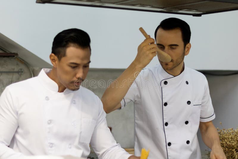 Chefs are Tasting Food Made in the Kitchen Stock Photo - Image of cook ...