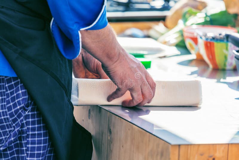 Chefs at Work in a Restaurant Kitchen Making Delicious Food Stock Photo ...