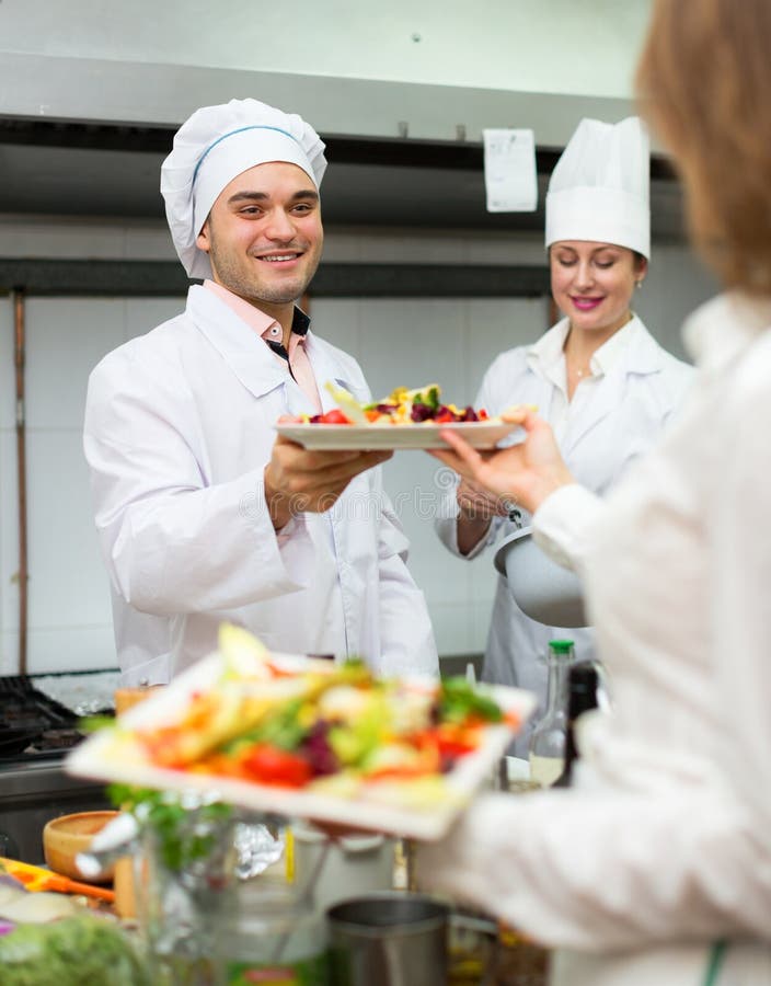 Chefs and young waiter stock image. Image of cafeteria - 57935381