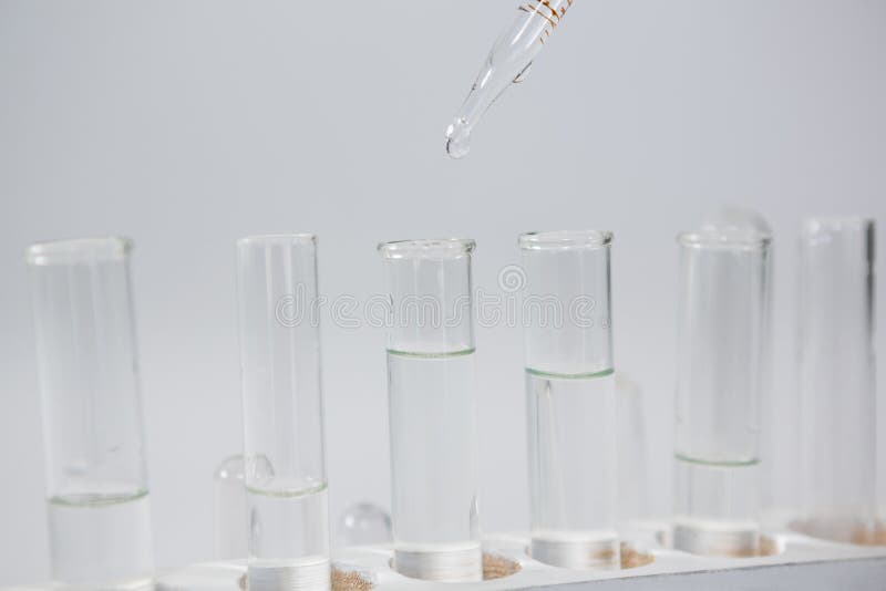 Chemical Being Drop into Test Tubes Stock Photo - Image of medical ...