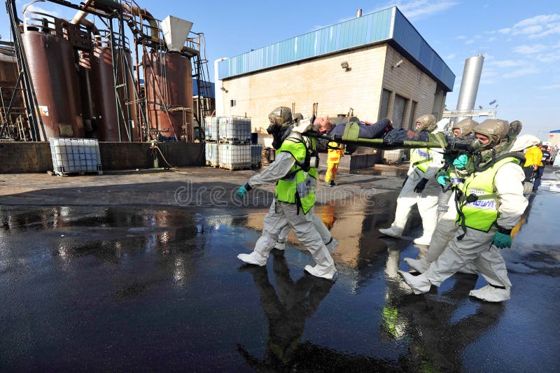 HAZMAT Team Members Discusses Chemical Disaster Stock Image - Image of ...
