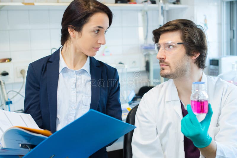 Chemical Engineer with Manager Working on Samples in Lab Stock Photo ...
