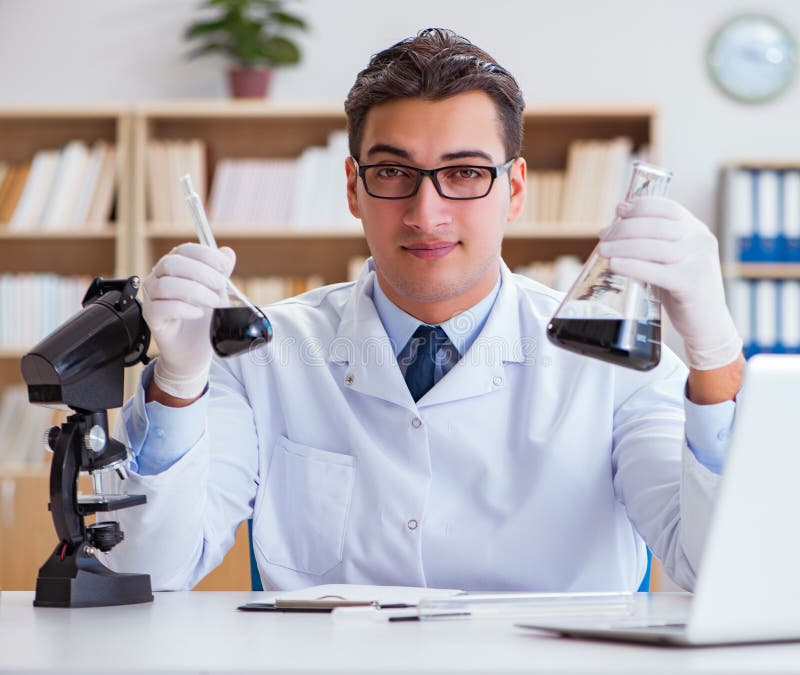 Chemical Engineer Working on Oil Samples in Lab Stock Photo - Image of ...