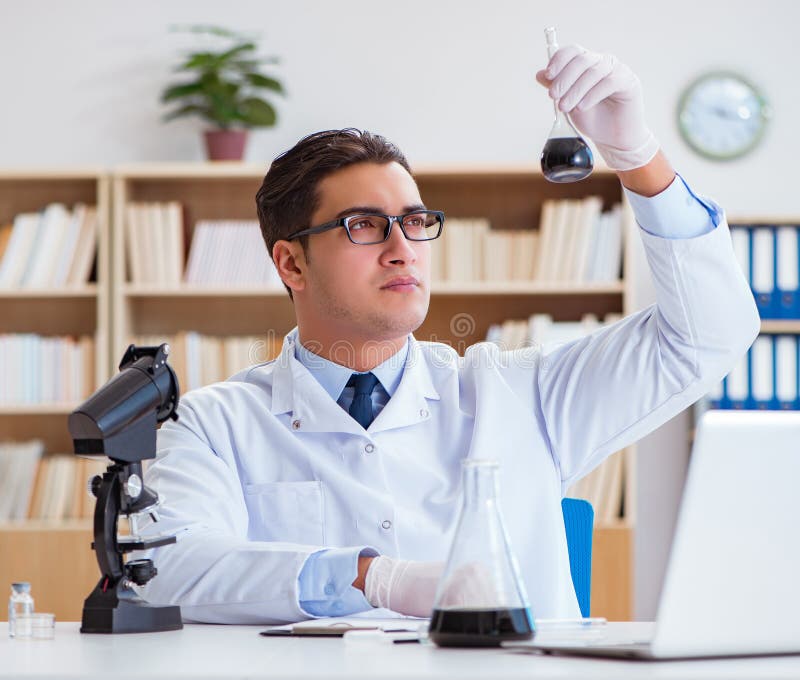 Chemical Engineer Working on Oil Samples in Lab Stock Image - Image of ...