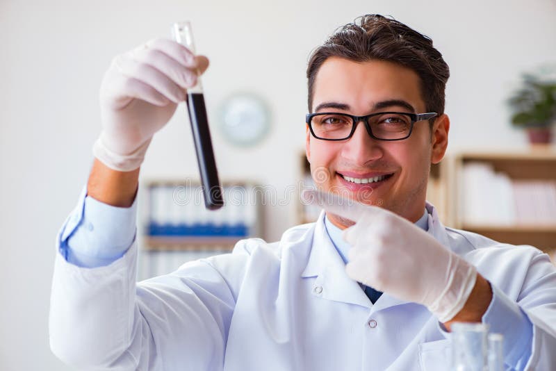 The Chemical Engineer Working on Oil Samples in Lab Stock Photo - Image ...