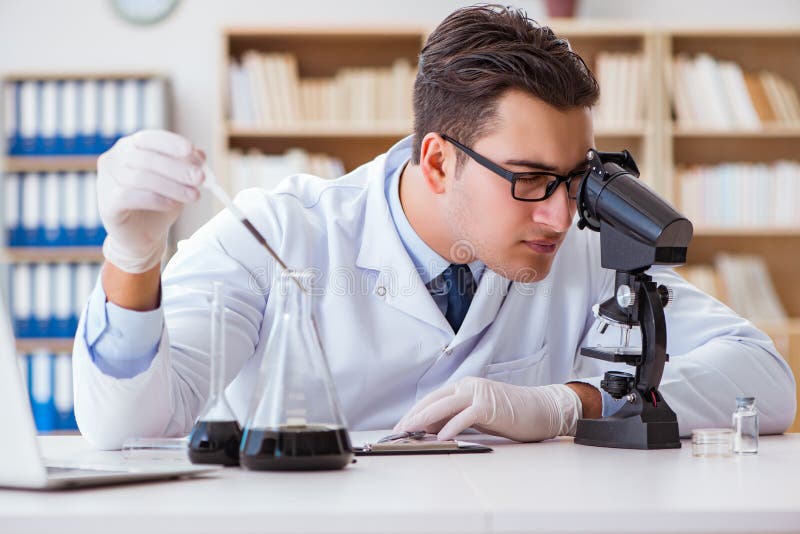 The Chemical Engineer Working on Oil Samples in Lab Stock Image - Image ...