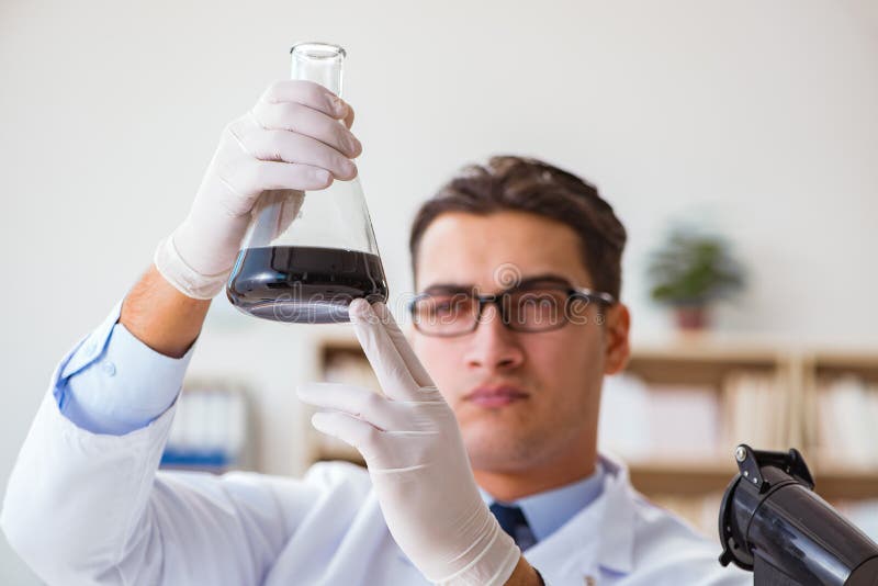 The Chemical Engineer Working on Oil Samples in Lab Stock Image - Image ...