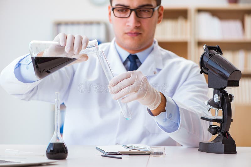 The Chemical Engineer Working on Oil Samples in Lab Stock Image - Image ...