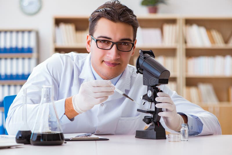 The Chemical Engineer Working on Oil Samples in Lab Stock Image - Image ...