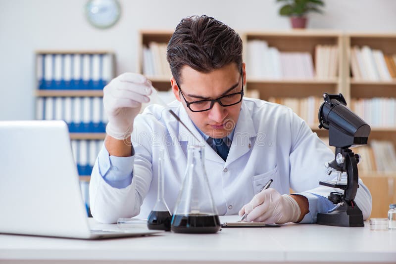 The Chemical Engineer Working on Oil Samples in Lab Stock Image - Image ...