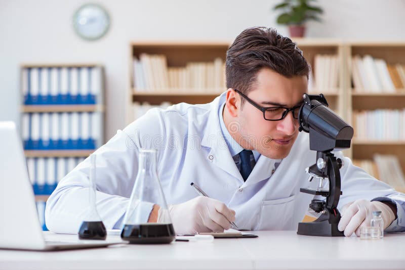 The Chemical Engineer Working on Oil Samples in Lab Stock Photo - Image ...