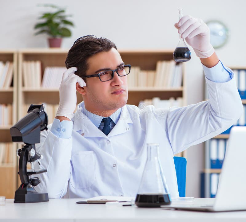 Chemical Engineer Working on Oil Samples in Lab Stock Photo - Image of ...