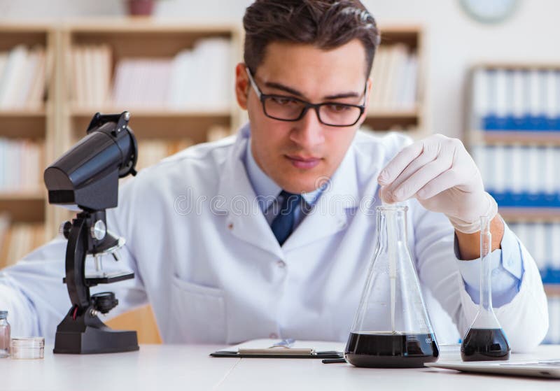 Chemical Engineer Working on Oil Samples in Lab Stock Photo - Image of ...