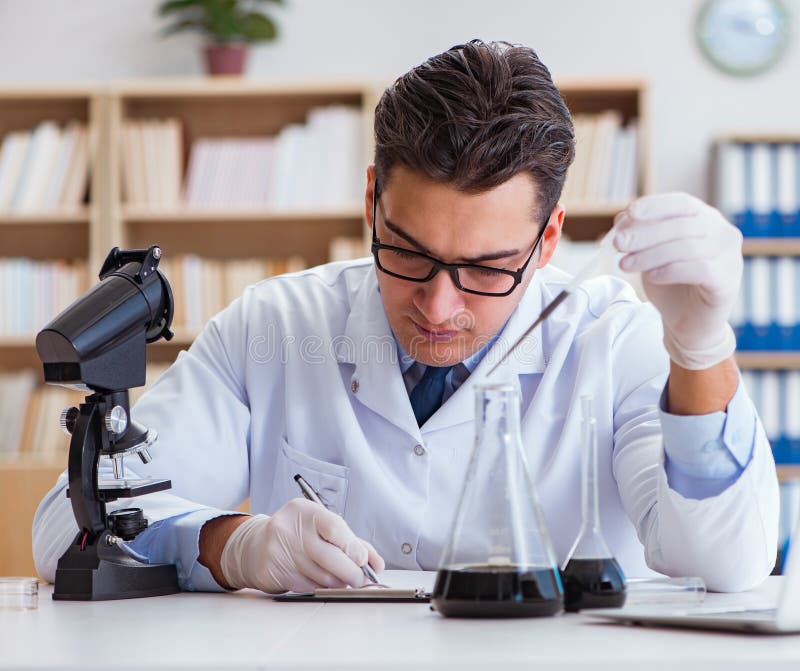 Chemical Engineer Working on Oil Samples in Lab Stock Image - Image of ...
