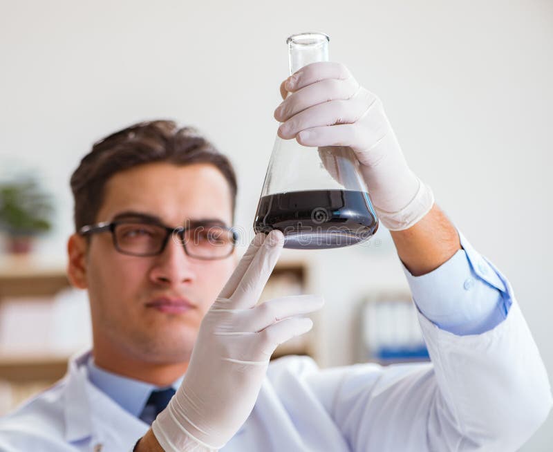Chemical Engineer Working on Oil Samples in Lab Stock Photo - Image of ...