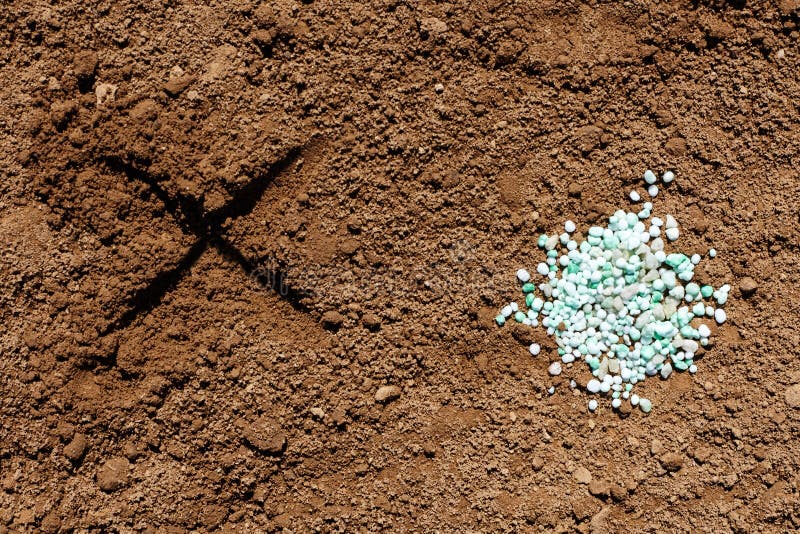 Chemical Fertilizer On Soil And Ex Symbol Written On The Ground. Stock ...