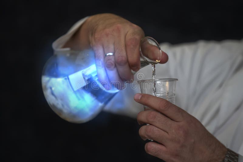 Chemical Flask with a Blue Solution and a Mystical Glow Stock Photo ...