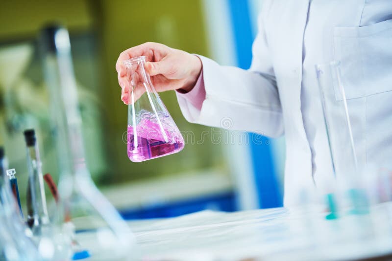 Chemical laboratory. Hand with flask with solution, Chemistry ...