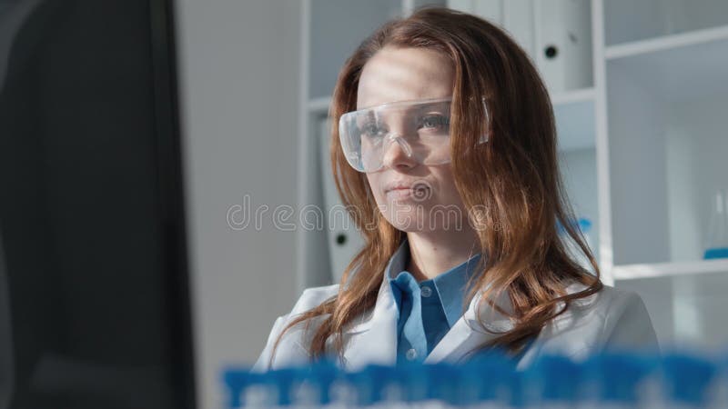 In the Chemical Laboratory, Where a Chemist Works at a Computer ...