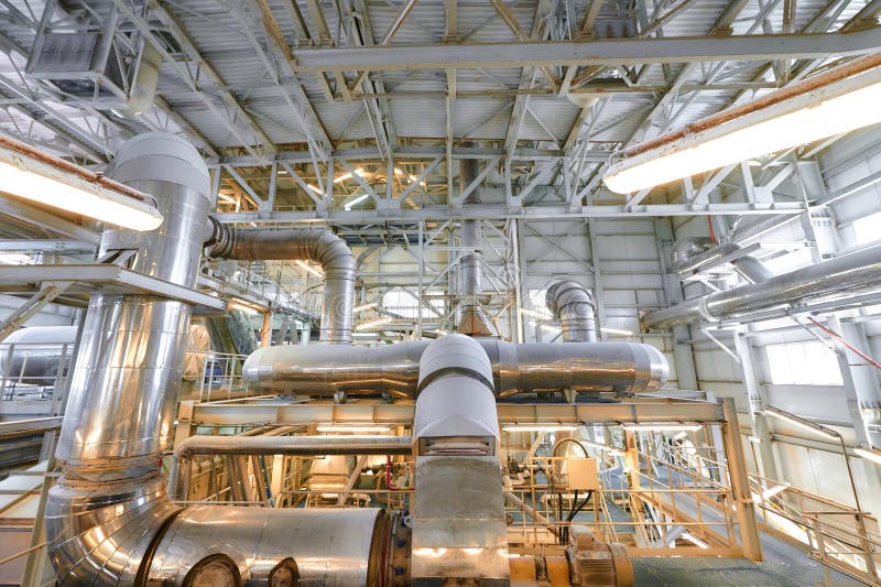 Chemical Plant Interior Showcasing Extensive Pipelines and Conveyors ...
