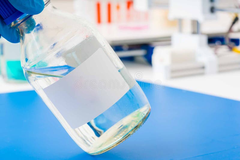 Chemical Solution in Lab Bottle Stock Image - Image of blue, closeup ...