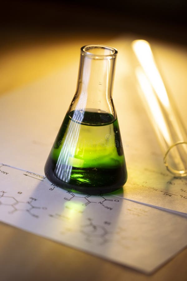 Chemical Tubes with Reaction Formulas Stock Photo - Image of laboratory ...