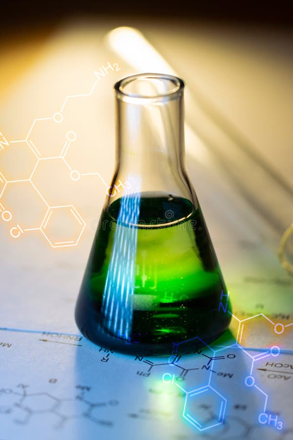 Chemical Tubes with Reaction Formulas Stock Photo - Image of research ...