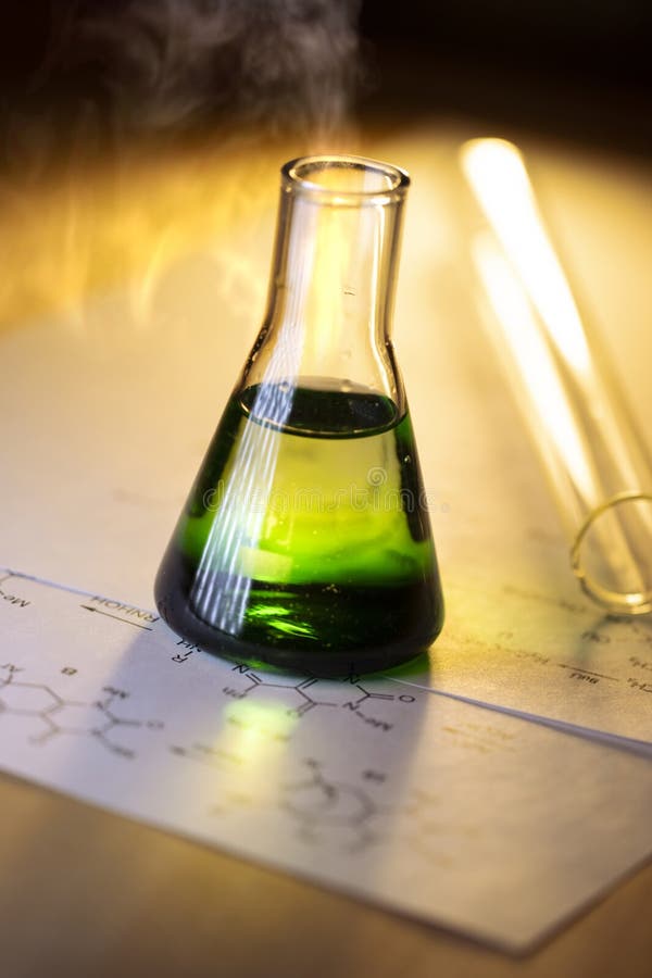 Chemical Tubes with Reaction Formulas Stock Photo - Image of laboratory ...