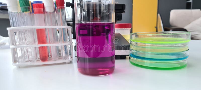 Chemical Violet Aqueous Solution in Glass Flask in Blue Educational ...