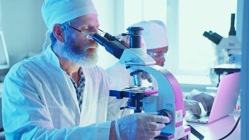 Chemist Analyzing Chemical Compounds in Innovative Laboratory Setting ...