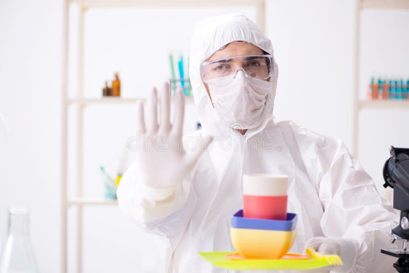 The Chemist Checking and Testing Plastic Dishes Stock Image - Image of ...