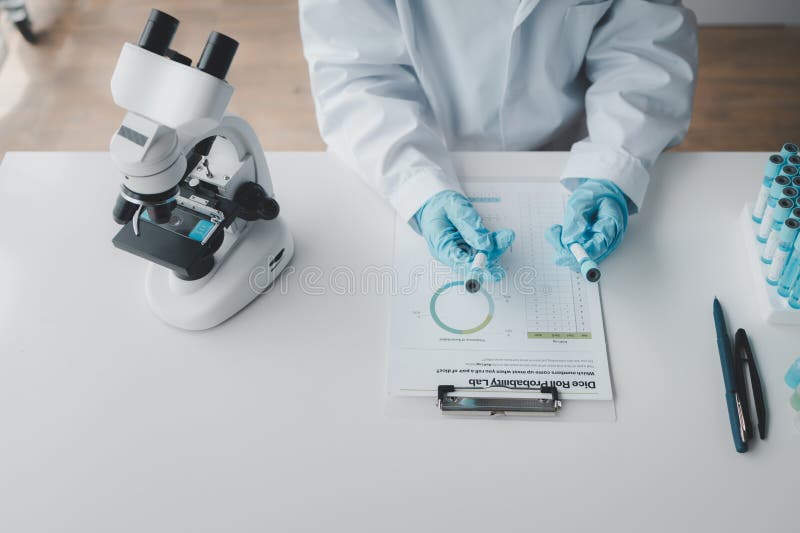 Chemist is Chemically Analyzing Test Tubes, Chemist is Doing an ...