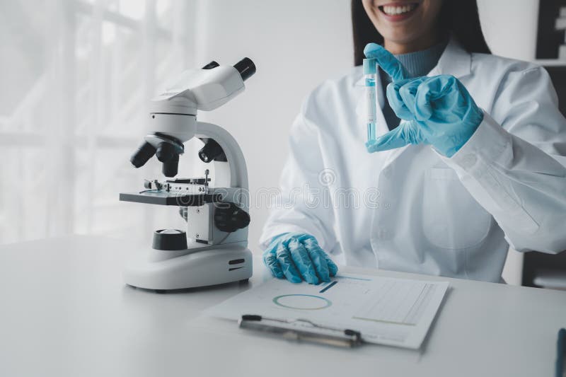 Chemist is Chemically Analyzing Test Tubes, Chemist is Doing an ...