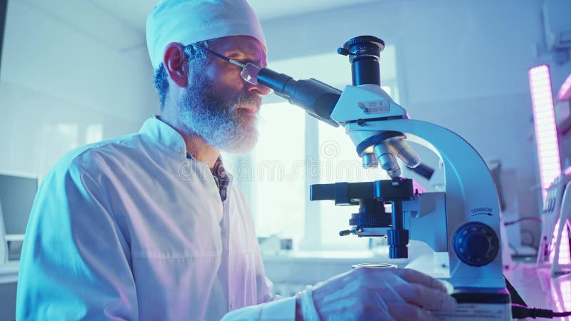 Chemist Analyzing Samples in Neon-lit Laboratory with Advanced ...