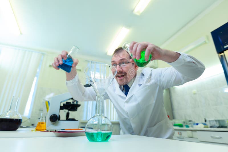 Chemist Crazy. a Mad Scientist Conducts Experiments in a Scientific ...