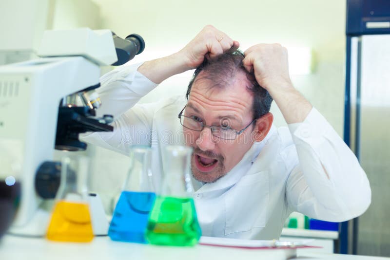 Chemist Crazy. a Mad Scientist Conducts Experiments in a Scientific ...