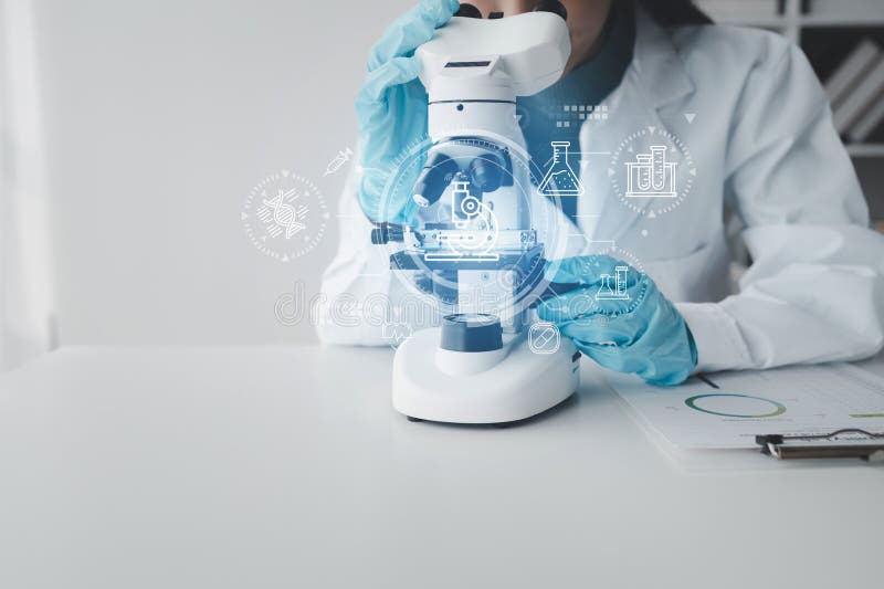 Chemist is Doing an Experiment in the Laboratory, a Scientist is Using ...