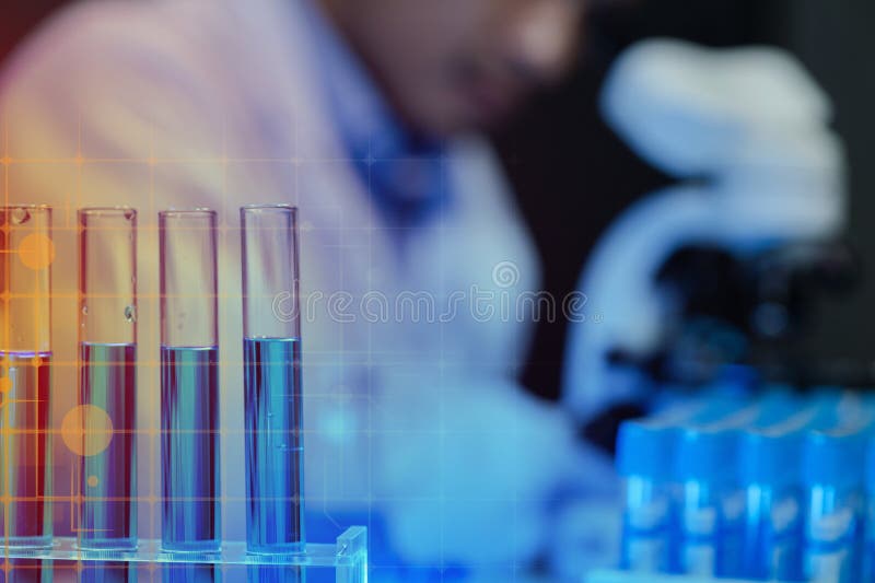 Chemist is Doing an Experiment in the Laboratory, a Scientist is Using ...