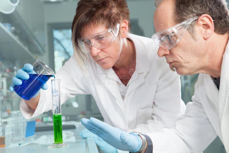 Female Chemical Engineer in Lab Stock Photo - Image of beaker, chemist ...