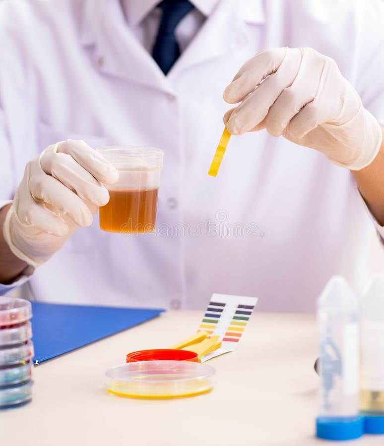 Chemist in the Lab Checking with Ph Strips Stock Image - Image of ...